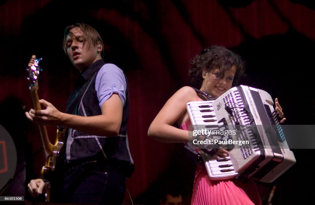 Photo Of Regine Chassagne And Win Butler And Arcade Fire Performing