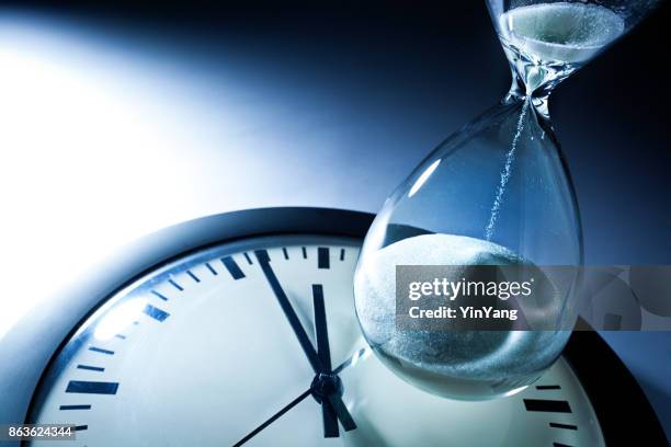 Deadline and Out of Time: Sand Timer Hourglass and Clock at Midnight ...