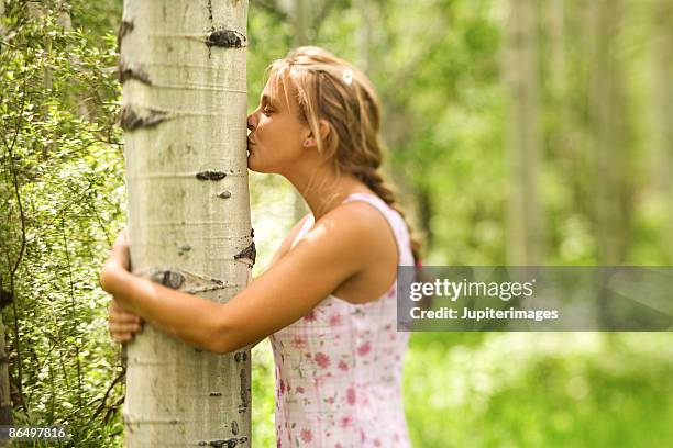 Tree Hugging Woman Photos And Premium High Res Pictures Getty Images