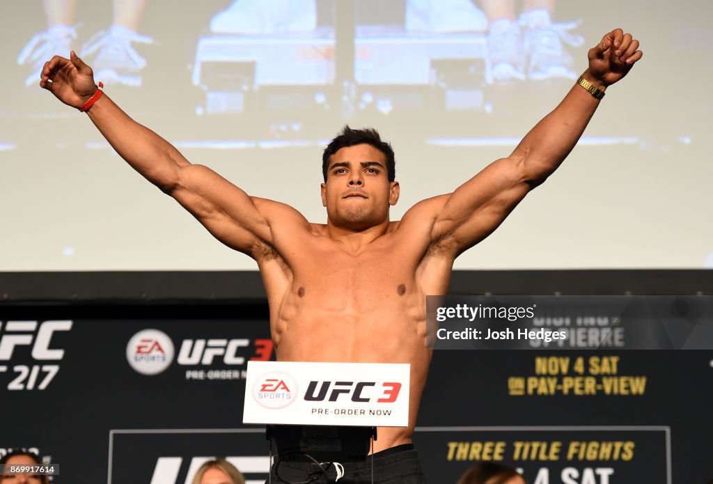 Paulo Costa Of Brazil Poses On The Scale During The Ufc 217 Weigh In