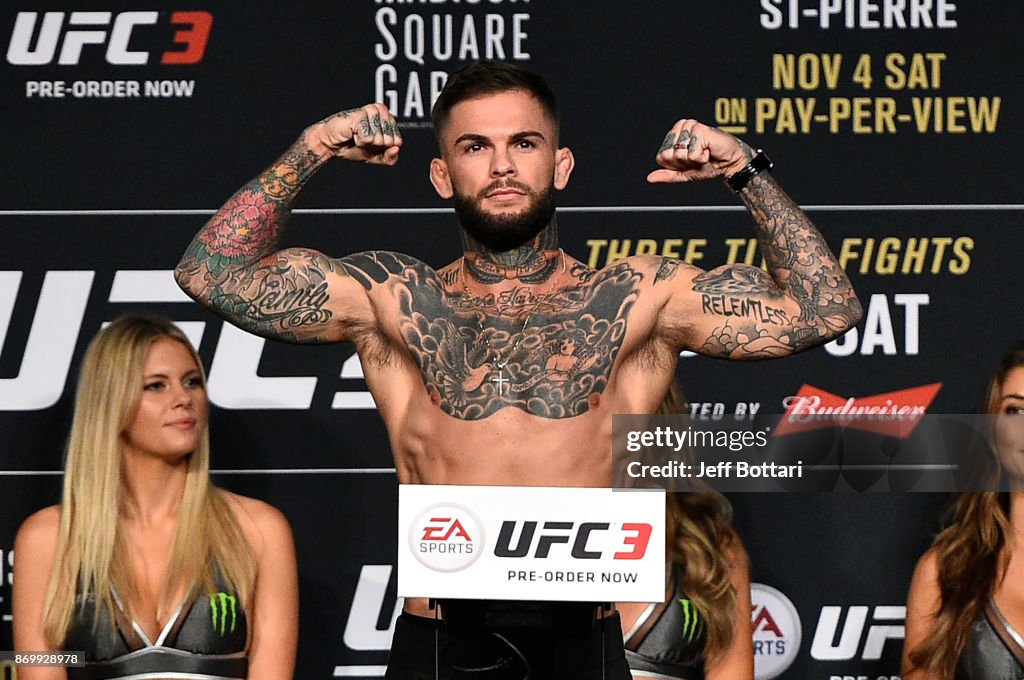 Cody Garbrandt Poses On The Scale During The Ufc 217 Weigh In Inside