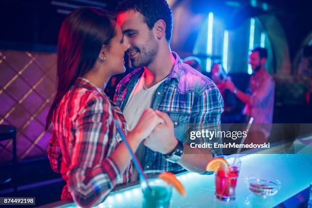 Couple Kissing Nightclub Photos And Premium High Res Pictures Getty