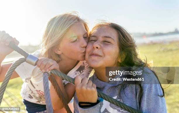Sisters Kissing Only Girls Photos And Premium High Res Pictures Getty