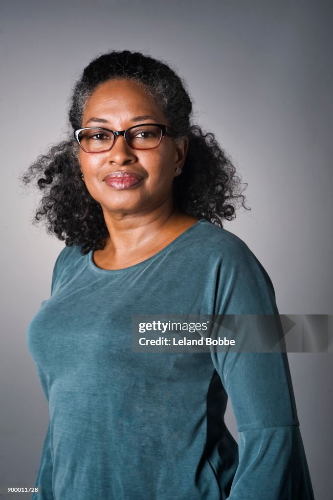 Portrait Of Middle Aged Mixed Race Woman High-Res Stock Photo - Getty ... Portrait Of Middle Aged Mixed Race Woman High-Res Stock Photo - Getty ...