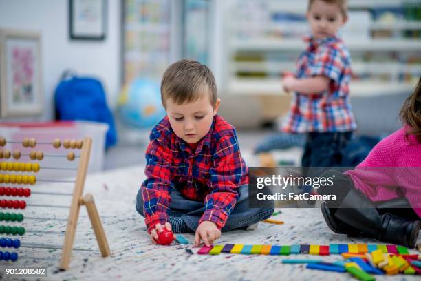 135 Child Lining Up Toys Stock Photos, High-Res Pictures, and Images ... 135 Child Lining Up Toys Stock Photos, High-Res Pictures, and Images ...