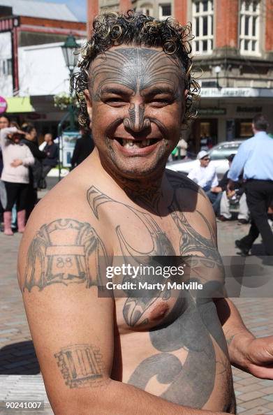 A Black Power Gang Member Shows His Patch Tattoo During A Protest