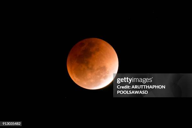 Blood Moon Total Lunar Eclipse High-Res Stock Photo - Getty Images Blood Moon Total Lunar Eclipse High-Res Stock Photo - Getty Images