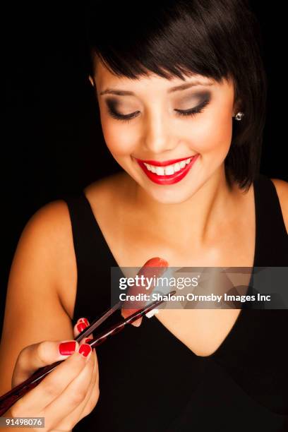 Girl Eating Sushi Photos And Premium High Res Pictures Getty Images
