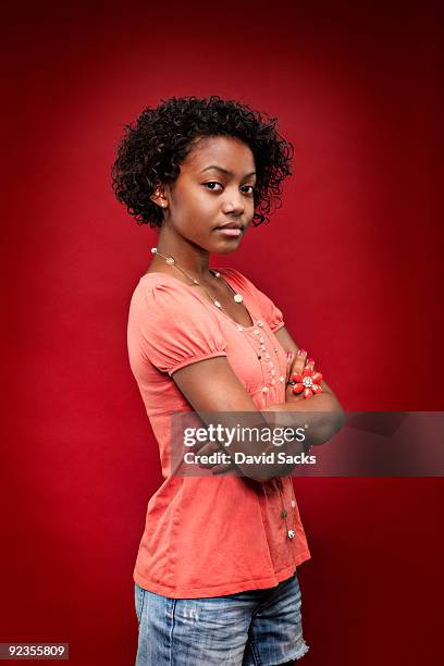 Girl Red Background Fotografias E Filmes Do Acervo Getty Images