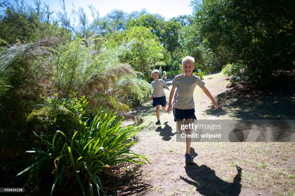 Two Boys Running High-Res Stock Photo - Getty Images Two Boys Running High-Res Stock Photo - Getty Images