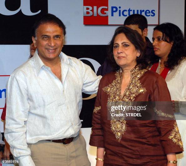 Former Indian cricketer Sunil Gavaskar poses with his wife at the ... Former Indian cricketer Sunil Gavaskar poses with his wife at the ...