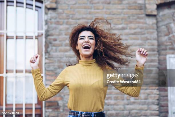 Woman Laughing Hysterically Photos And Premium High Res Pictures