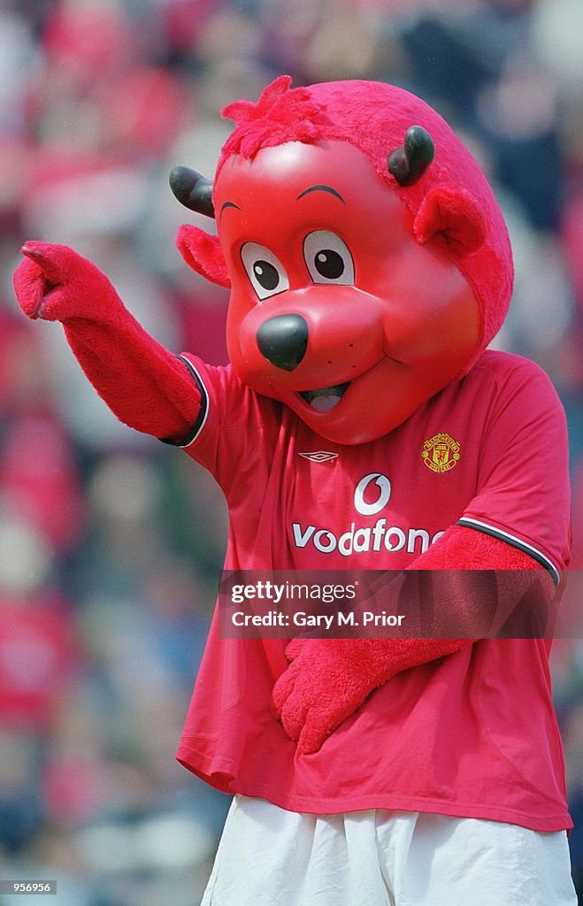 Manchester United Mascot Fred The Red Entertains The Crowd During The