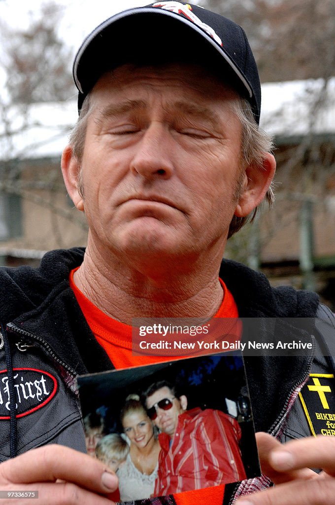 Donald Hogan Father Of Anna Nicole Smith Holds A Picture From 1993