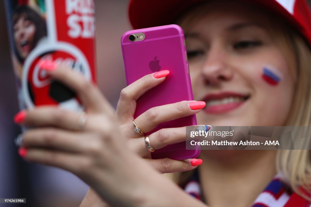 A Female Fan Of Russia Takes A Photo Prior To The 2018 Fifa World Cup