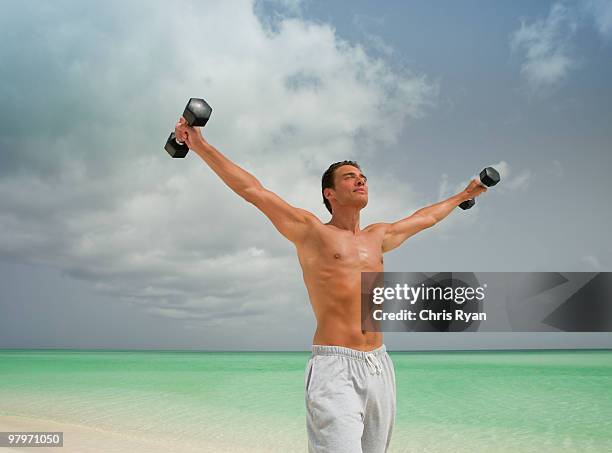 Dumbbell Raises Photos And Premium High Res Pictures Getty Images