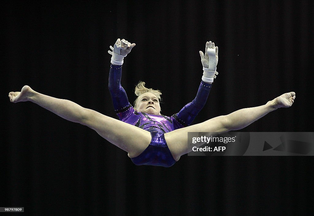 Russias Tatiana Nabieva Performs On The Uneven Bars During The Women
