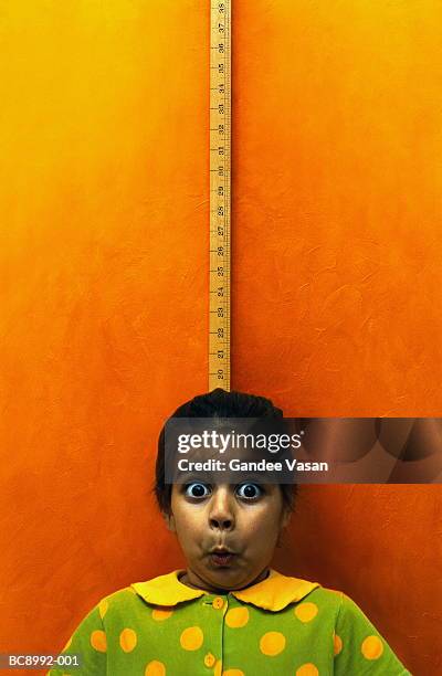 Girl Height Chart Photos And Premium High Res Pictures Getty Images
