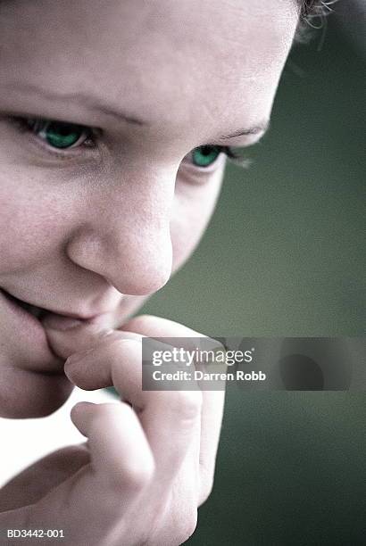 Girl Biting Finger Photos And Premium High Res Pictures Getty Images