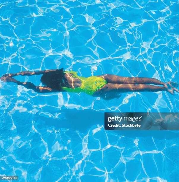 One Piece Swimsuit Underwater Photos And Premium High Res Pictures