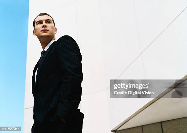 Low Angle Shot Man Standing Photos and Premium High Res Pictures ... Low Angle Shot Man Standing Photos and Premium High Res Pictures ...