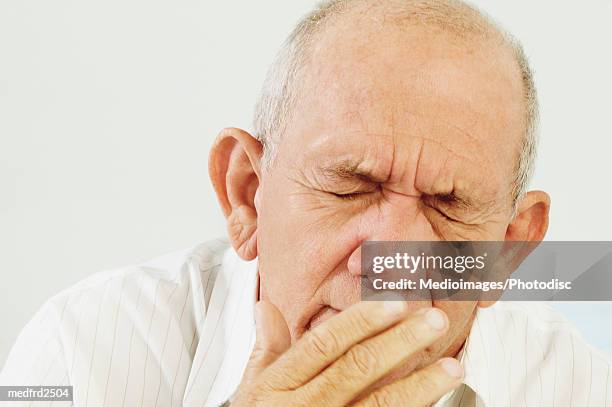 17 Finger Under Nose Stock Photos, High-Res Pictures, and Images ... 17 Finger Under Nose Stock Photos, High-Res Pictures, and Images ...